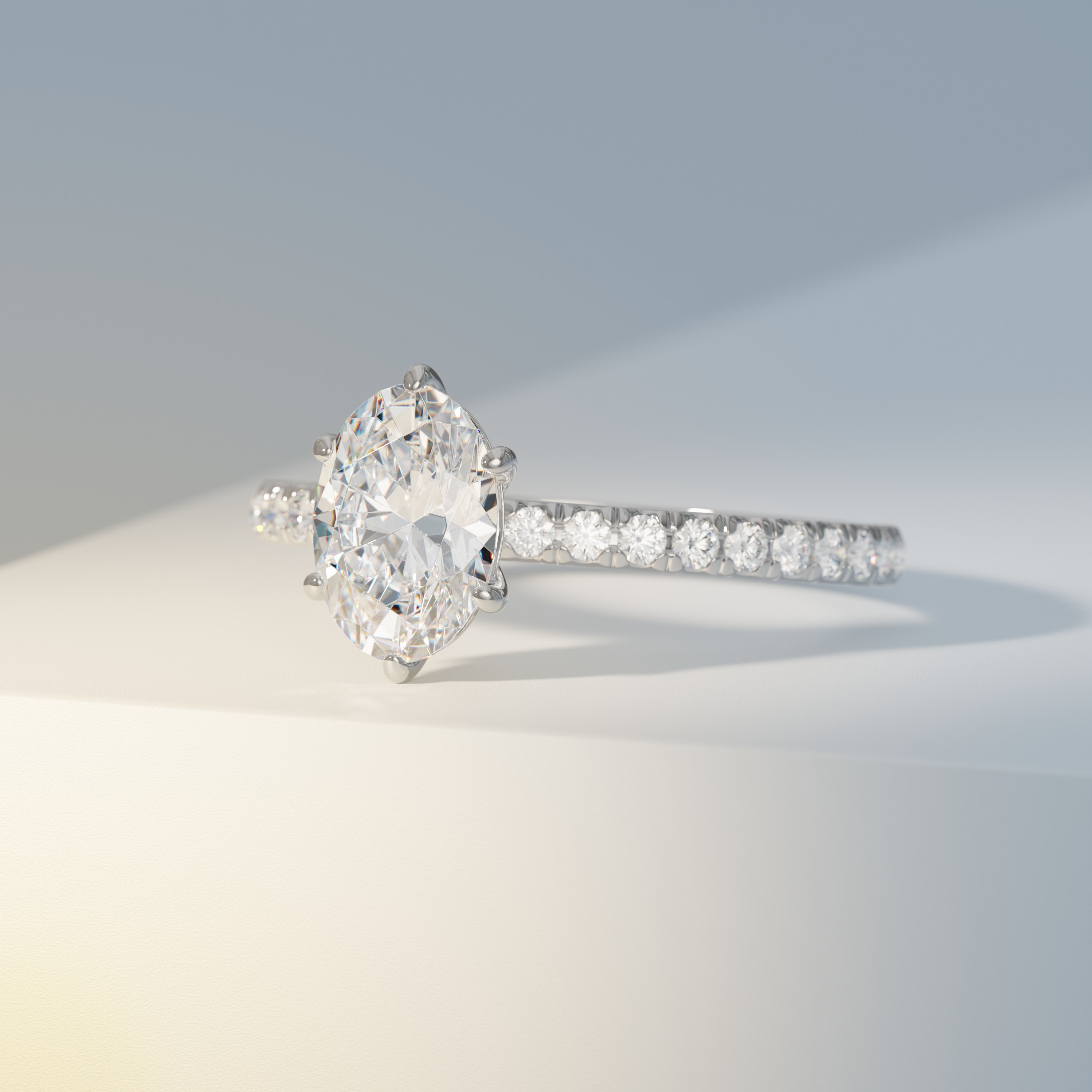 Oval 6 Claw Set with Pavé Band Engagement Ring | Four Words